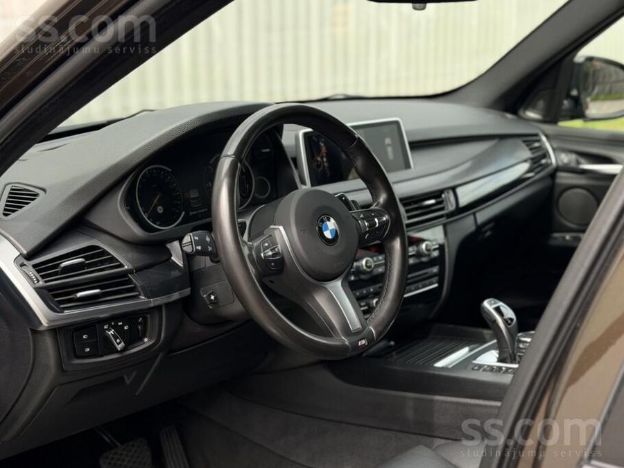 Brown BMW X5 2016 in Riga, with an engine capacity of 3.00 L and mileage of 250 thousand km for 22900 €, photo 8 on AUTOMOTO.COM.LV