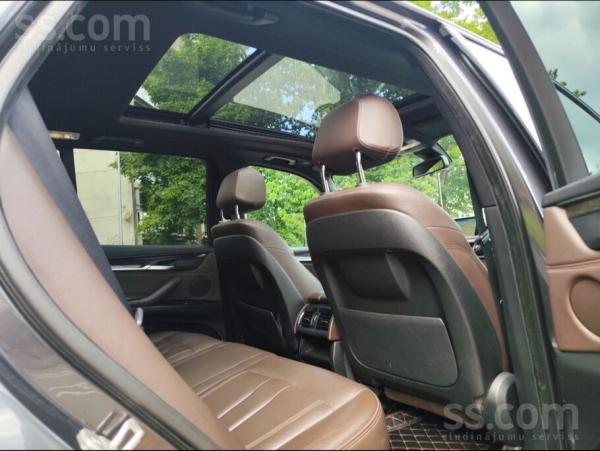 Brown BMW X5 2016 in Riga, with an engine capacity of 2.00 L and mileage of 291 thousand km for 18999 €, photo 7 on AUTOMOTO.COM.LV
