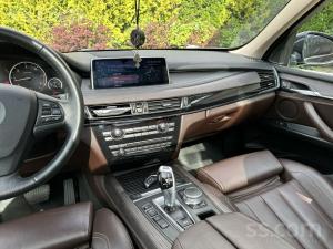 Brown BMW X5 2017 in Riga, with an engine capacity of 3.00 L and mileage of 268 thousand km for 27000 €, photo 7 on AUTOMOTO.COM.LV