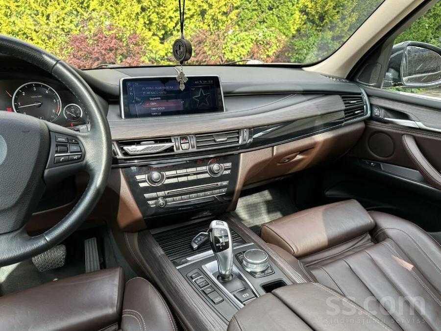 Brown BMW X5 2017 in Riga, with an engine capacity of 3.00 L and mileage of 268 thousand km for 27000 €, photo 7 on AUTOMOTO.COM.LV