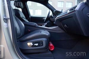 Brown BMW X5 2019 in Riga, with an engine capacity of 3.00 L and mileage of 82 thousand km for 50850 €, photo 20 on AUTOMOTO.COM.LV