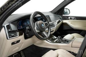 Brown BMW X5 2021 in Riga, with an engine capacity of 3.00 L and mileage of 140 thousand km for 48500 €, photo 11 on AUTOMOTO.COM.LV
