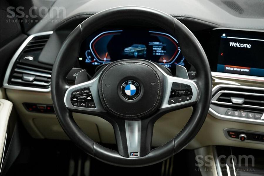 Brown BMW X5 2021 in Riga, with an engine capacity of 3.00 L and mileage of 140 thousand km for 48500 €, photo 12 on AUTOMOTO.COM.LV