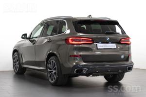 Brown BMW X5 2021 in Riga, with an engine capacity of 3.00 L and mileage of 140 thousand km for 48500 €, photo 15 on AUTOMOTO.COM.LV