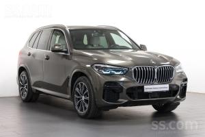 Brown BMW X5 2021 in Riga, with an engine capacity of 3.00 L and mileage of 140 thousand km for 48500 €, photo 16 on AUTOMOTO.COM.LV