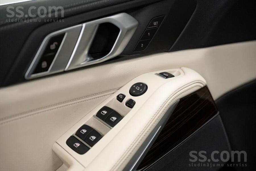 Brown BMW X5 2021 in Riga, with an engine capacity of 3.00 L and mileage of 140 thousand km for 48500 €, photo 26 on AUTOMOTO.COM.LV