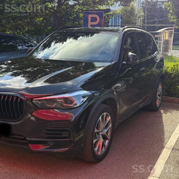 Brown BMW X5 2021 in Riga, with an engine capacity of 3.00 L and mileage of 70 thousand km for 43900 €, photo 7 on AUTOMOTO.COM.LV