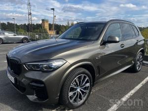 Коричневый БМВ Х5 2022 в Рига, объемом двигателя 3.00 л и пробегом 97 тыс. км за 54950 €, фото  на AUTOMOTO.COM.LV