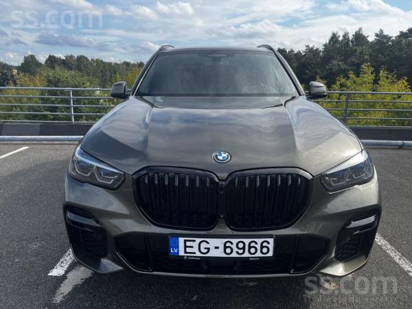 Brown BMW X5 2022 in Riga, with an engine capacity of 3.00 L and mileage of 97 thousand km for 54950 €, photo 3 on AUTOMOTO.COM.LV