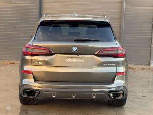 Brown BMW X5 2022 in Kaunas, with an engine capacity of 3.00 L and mileage of 142 thousand km for 29750 €, photo 7 on AUTOMOTO.COM.LV