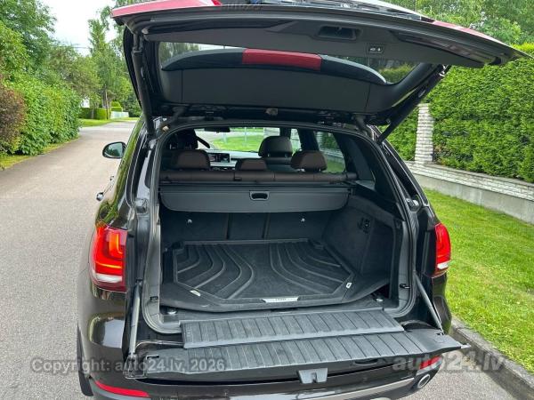 Brown BMW X5 2014 in Tallinn, with an engine capacity of 3.00 L and mileage of 180 thousand km for 19800 €, photo 7 on AUTOMOTO.COM.LV