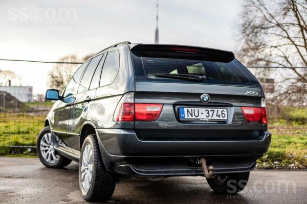 Green BMW X5 2006 in Riga, with an engine capacity of 3.00 L and mileage of 315 thousand km for 6990 €, photo 6 on AUTOMOTO.COM.LV