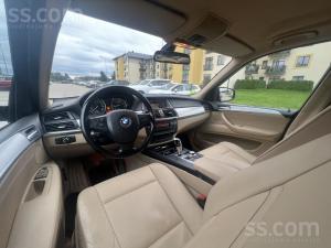 Green BMW X5 2008 in Riga, with an engine capacity of 3.00 L and mileage of 0 thousand km for 6300 €, photo 11 on AUTOMOTO.COM.LV