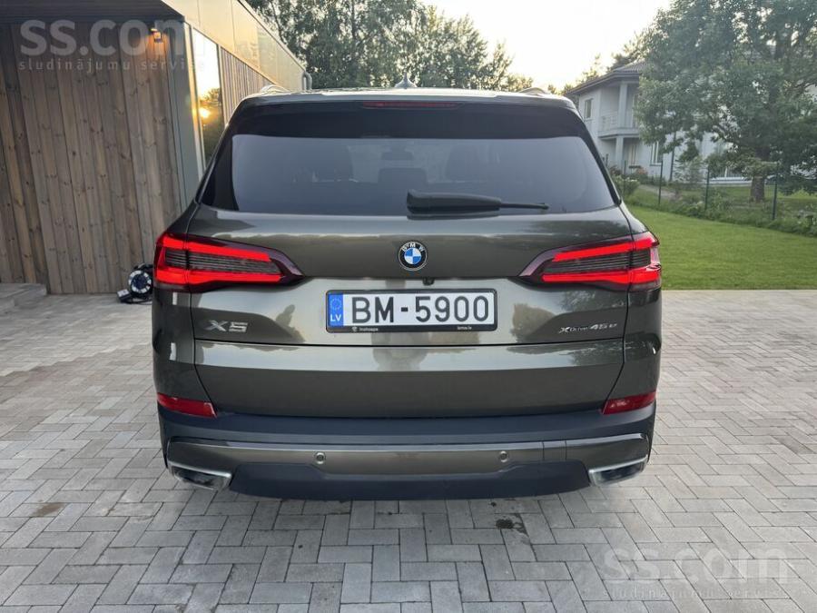 Green BMW X5 2020 in Riga, with an engine capacity of 3.00 L and mileage of 125 thousand km for 35400 €, photo 6 on AUTOMOTO.COM.LV