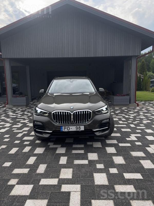 Green BMW X5 2021 in Riga, with an engine capacity of 3.00 L and mileage of 140 thousand km for 41999 €, photo 7 on AUTOMOTO.COM.LV
