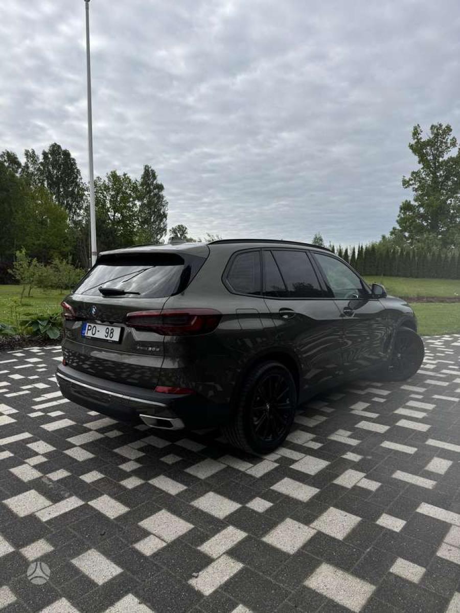 Green BMW X5 2021 in Riga, with an engine capacity of 3.00 L and mileage of 143 thousand km for 43500 €, photo 7 on AUTOMOTO.COM.LV