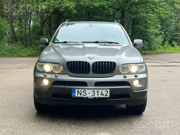 Grey BMW X5 2006 in Riga, with an engine capacity of 3.00 L and mileage of 0 thousand km for 5299 €, photo 8 on AUTOMOTO.COM.LV