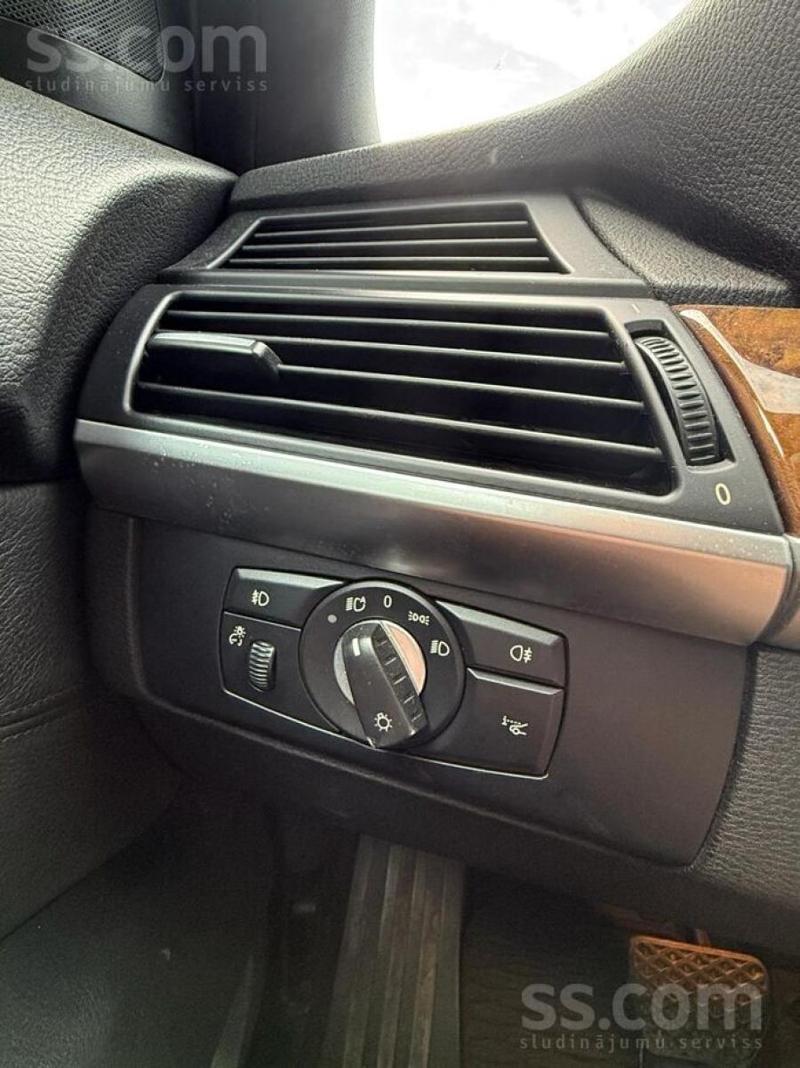Grey BMW X5 2007 in Riga, with an engine capacity of 4.80 L and mileage of 22 thousand km for 6880 €, photo 12 on AUTOMOTO.COM.LV