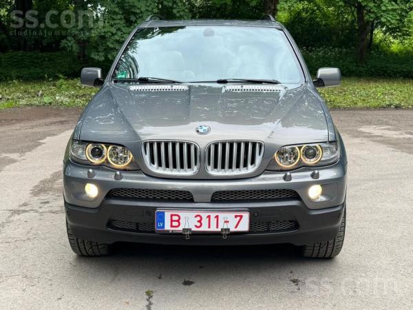 Grey BMW X5 2007 in Riga, with an engine capacity of 3.00 L and mileage of 0 thousand km for 8699 €, photo 8 on AUTOMOTO.COM.LV