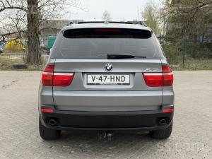 Grey BMW X5 2008 in Riga, with an engine capacity of 3.00 L and mileage of 0 thousand km for 7900 €, photo 11 on AUTOMOTO.COM.LV
