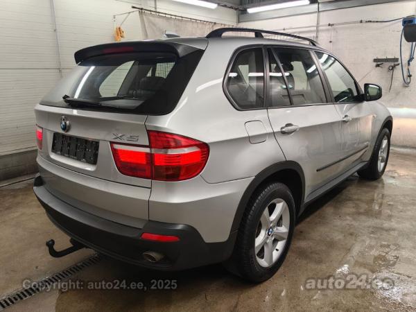 Grey BMW X5 2009 in Viljandi, with an engine capacity of 3.00 L and mileage of 217 thousand km for 9790 €, photo 11 on AUTOMOTO.COM.LV