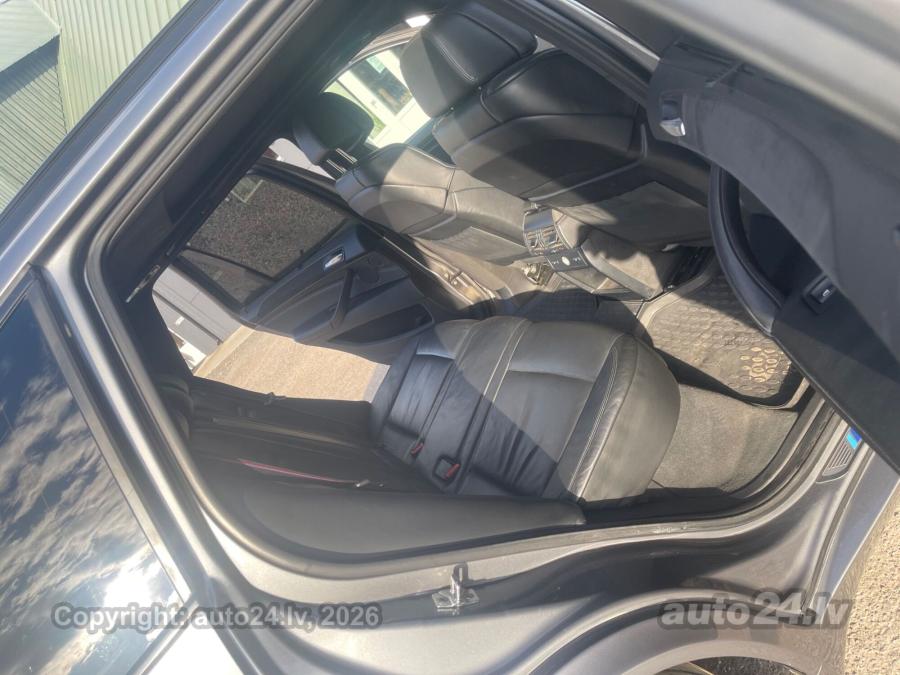 Grey BMW X5 2009 in Tallinn, with an engine capacity of 3.00 L and mileage of 315 thousand km for 15000 €, photo 13 on AUTOMOTO.COM.LV