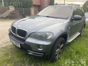 Grey BMW X5 2009 in Riga, with an engine capacity of 3.00 L and mileage of 309 thousand km for 5995 €, photo 4 on AUTOMOTO.COM.LV