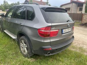 Grey BMW X5 2009 in Riga, with an engine capacity of 3.00 L and mileage of 309 thousand km for 5995 €, photo 5 on AUTOMOTO.COM.LV