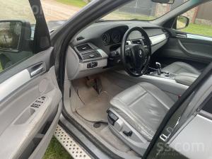 Grey BMW X5 2009 in Riga, with an engine capacity of 3.00 L and mileage of 309 thousand km for 5995 €, photo 12 on AUTOMOTO.COM.LV