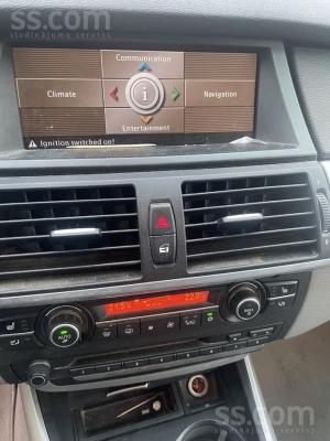 Grey BMW X5 2009 in Riga, with an engine capacity of 3.00 L and mileage of 309 thousand km for 5995 €, photo 13 on AUTOMOTO.COM.LV