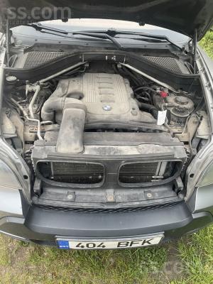 Grey BMW X5 2009 in Riga, with an engine capacity of 3.00 L and mileage of 309 thousand km for 5995 €, photo 14 on AUTOMOTO.COM.LV