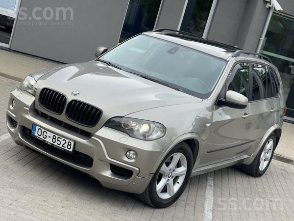 Grey BMW X5 2009 in Jurmala, with an engine capacity of 3.00 L and mileage of 0 thousand km for 8790 €, photo 1 on AUTOMOTO.COM.LV