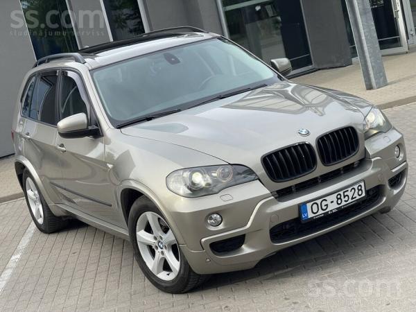 Grey BMW X5 2009 in Jurmala, with an engine capacity of 3.00 L and mileage of 0 thousand km for 8790 €, photo 3 on AUTOMOTO.COM.LV