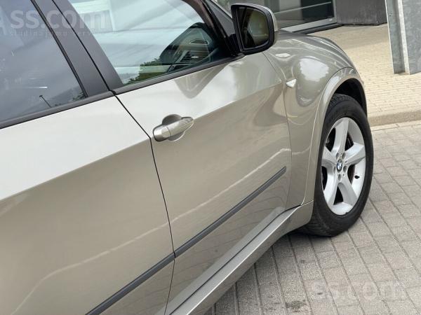 Grey BMW X5 2009 in Jurmala, with an engine capacity of 3.00 L and mileage of 0 thousand km for 8790 €, photo 10 on AUTOMOTO.COM.LV
