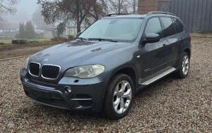 Grey BMW X5 2010 in Raseiniai, with an engine capacity of 2.99 L and mileage of 295 thousand km for 7900 €, photo 4 on AUTOMOTO.COM.LV