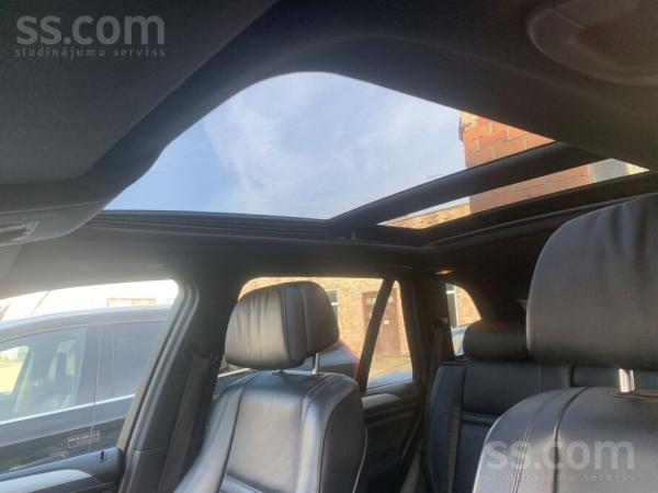 Grey BMW X5 2010 in Riga, with an engine capacity of 3.00 L and mileage of 233 thousand km for 12000 €, photo 6 on AUTOMOTO.COM.LV