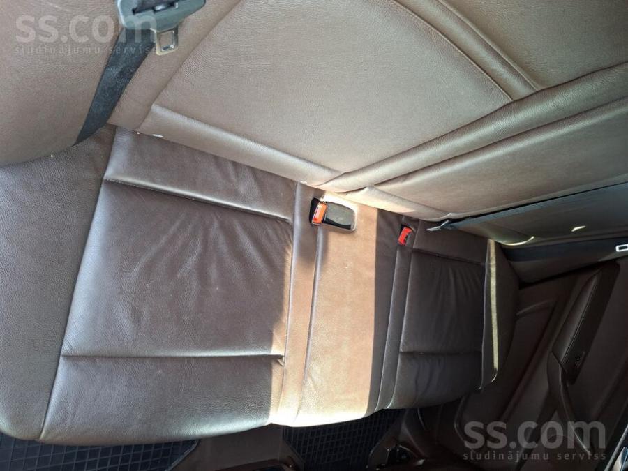 Grey BMW X5 2010 in Riga, with an engine capacity of 3.00 L and mileage of 294 thousand km for 14200 €, photo 27 on AUTOMOTO.COM.LV