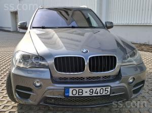 Pelēks BMW X5 2010 Rīga, ar dzinēja tilpumu 3.00 L un nobraukumu 295 tūkst. km par 12990 €, foto 13 vietnē AUTOMOTO.COM.LV