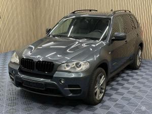 Grey BMW X5 2010 in Marijampole, with an engine capacity of 2.99 L and mileage of 264 thousand km for 10350 €, photo 11 on AUTOMOTO.COM.LV