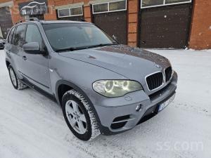 Grey BMW X5 2011 in Rezekne, with an engine capacity of 3.00 L and mileage of 244 thousand km for 10999 €, photo 8 on AUTOMOTO.COM.LV