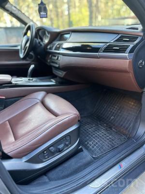 Grey BMW X5 2011 in Riga, with an engine capacity of 3.00 L and mileage of 257 thousand km for 11850 €, photo 10 on AUTOMOTO.COM.LV