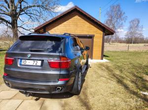 Grey BMW X5 2011 in Cesis, with an engine capacity of 3.00 L and mileage of 305 thousand km for 12350 €, photo 16 on AUTOMOTO.COM.LV