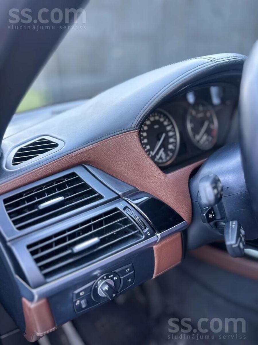 Pelēks BMW X5 2011 Rīga, ar dzinēja tilpumu 3.00 L un nobraukumu 256 tūkst. km par 12850 €, foto 9 vietnē AUTOMOTO.COM.LV
