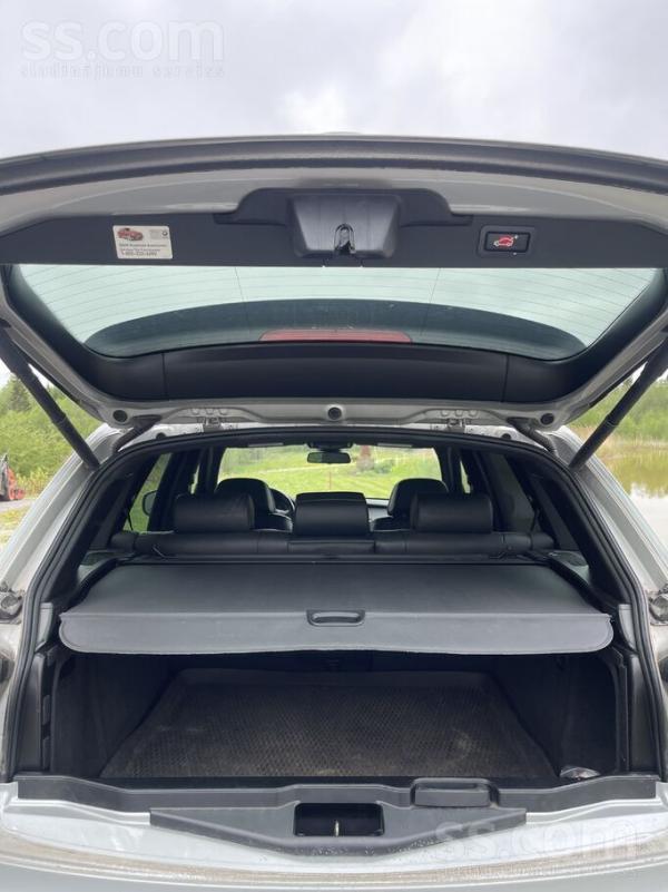 Grey BMW X5 2012 in Saldus, with an engine capacity of 3.00 L and mileage of 304 thousand km for 12990 €, photo 9 on AUTOMOTO.COM.LV