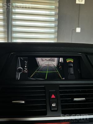 Grey BMW X5 2012 in Valmiera, with an engine capacity of 3.00 L and mileage of 97 thousand km for 19990 €, photo 5 on AUTOMOTO.COM.LV