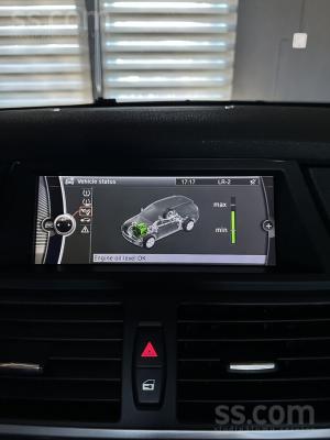 Grey BMW X5 2012 in Valmiera, with an engine capacity of 3.00 L and mileage of 97 thousand km for 19990 €, photo 10 on AUTOMOTO.COM.LV