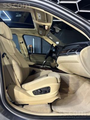 Grey BMW X5 2012 in Valmiera, with an engine capacity of 3.00 L and mileage of 97 thousand km for 19990 €, photo 28 on AUTOMOTO.COM.LV