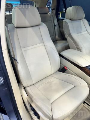 Grey BMW X5 2012 in Valmiera, with an engine capacity of 3.00 L and mileage of 97 thousand km for 19990 €, photo 33 on AUTOMOTO.COM.LV