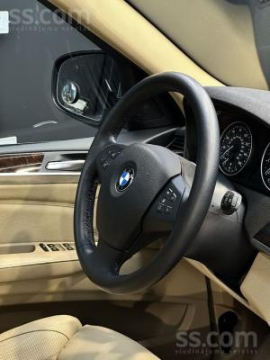 Grey BMW X5 2012 in Valmiera, with an engine capacity of 3.00 L and mileage of 97 thousand km for 19990 €, photo 35 on AUTOMOTO.COM.LV