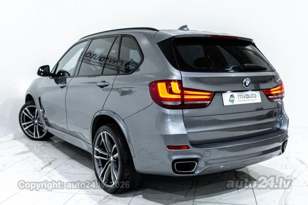 Grey BMW X5 2013 in Tallinn, with an engine capacity of 3.00 L and mileage of 185 thousand km for 17990 €, photo 7 on AUTOMOTO.COM.LV